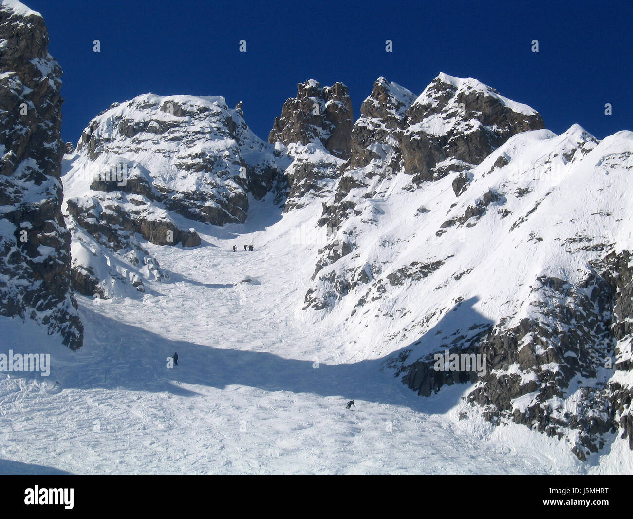 piste entry through the rocks Stock Photo - Alamy