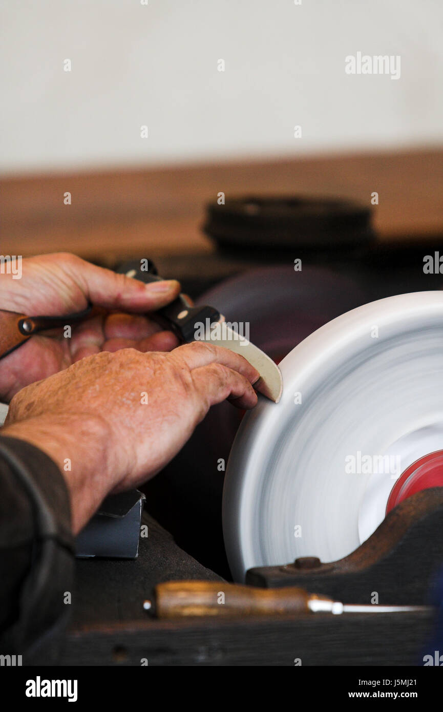 hand hands details nostalgic blade grind grindstone polisher business ...