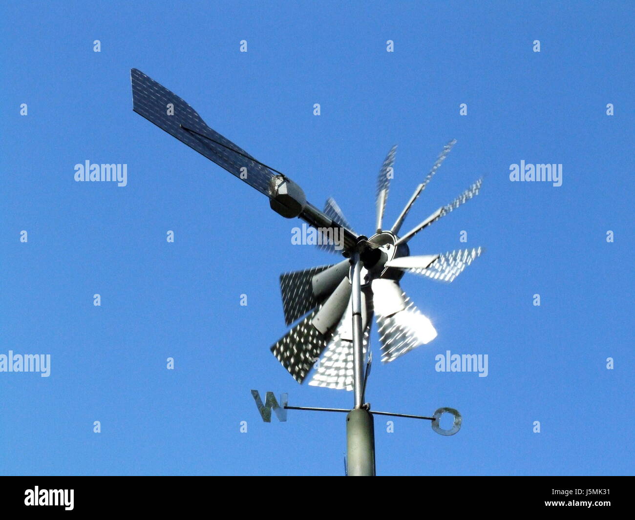 object turn twirl small tiny little short silver metal wind force wind ...