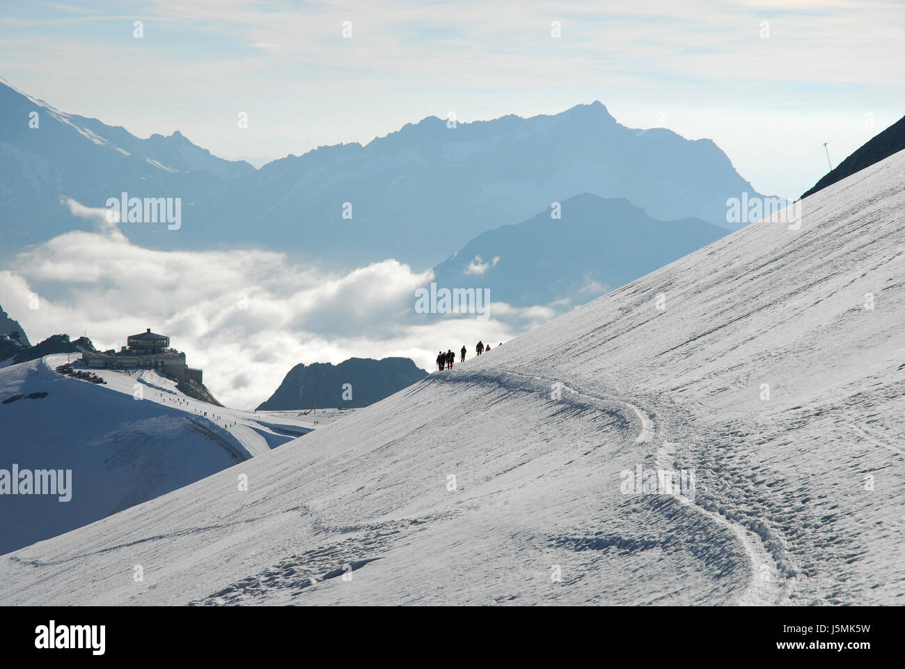 ice track rise climb climbing ascend uphill tread clamber climber ...