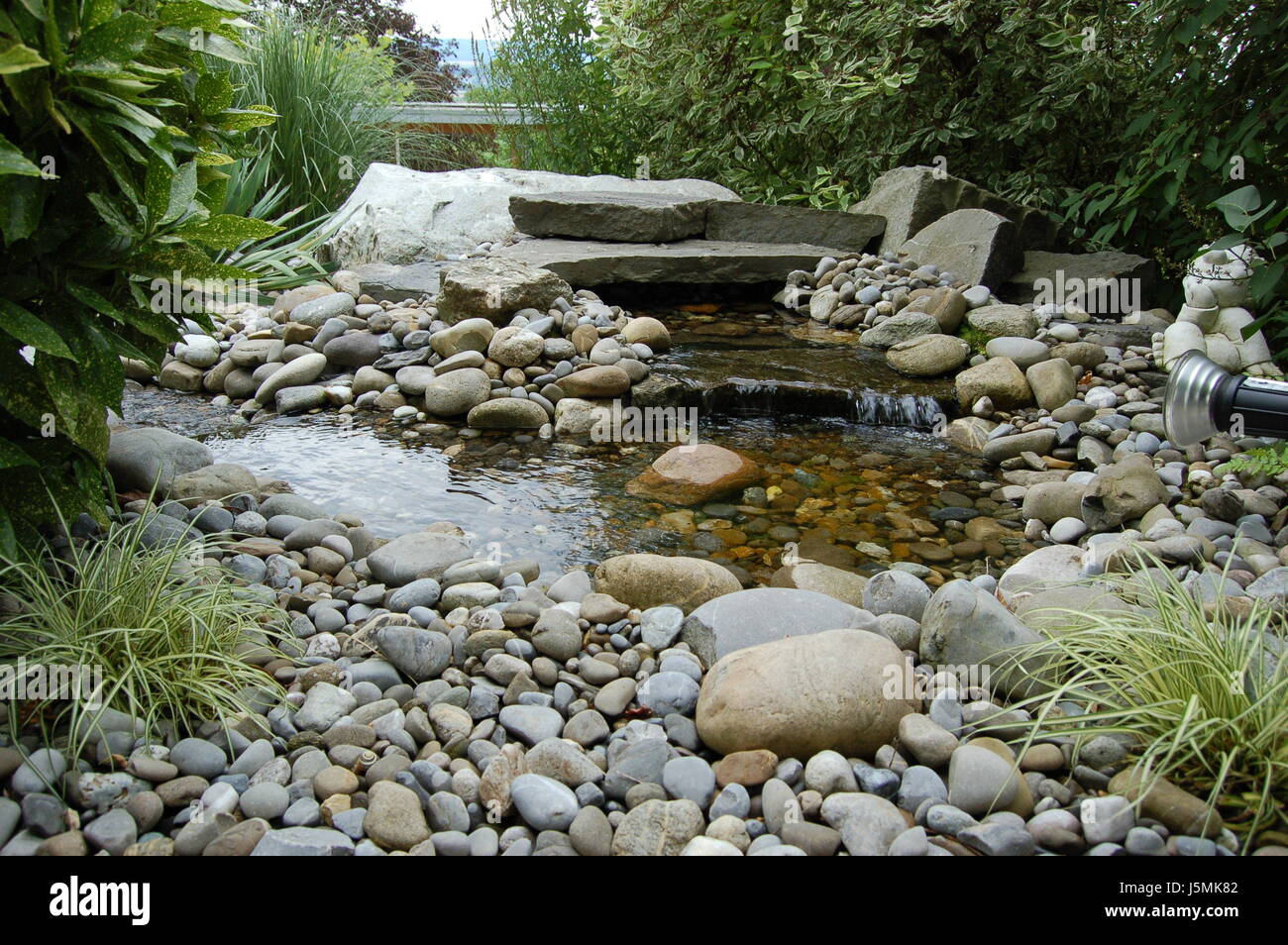artificial stream beginning Stock Photo - Alamy