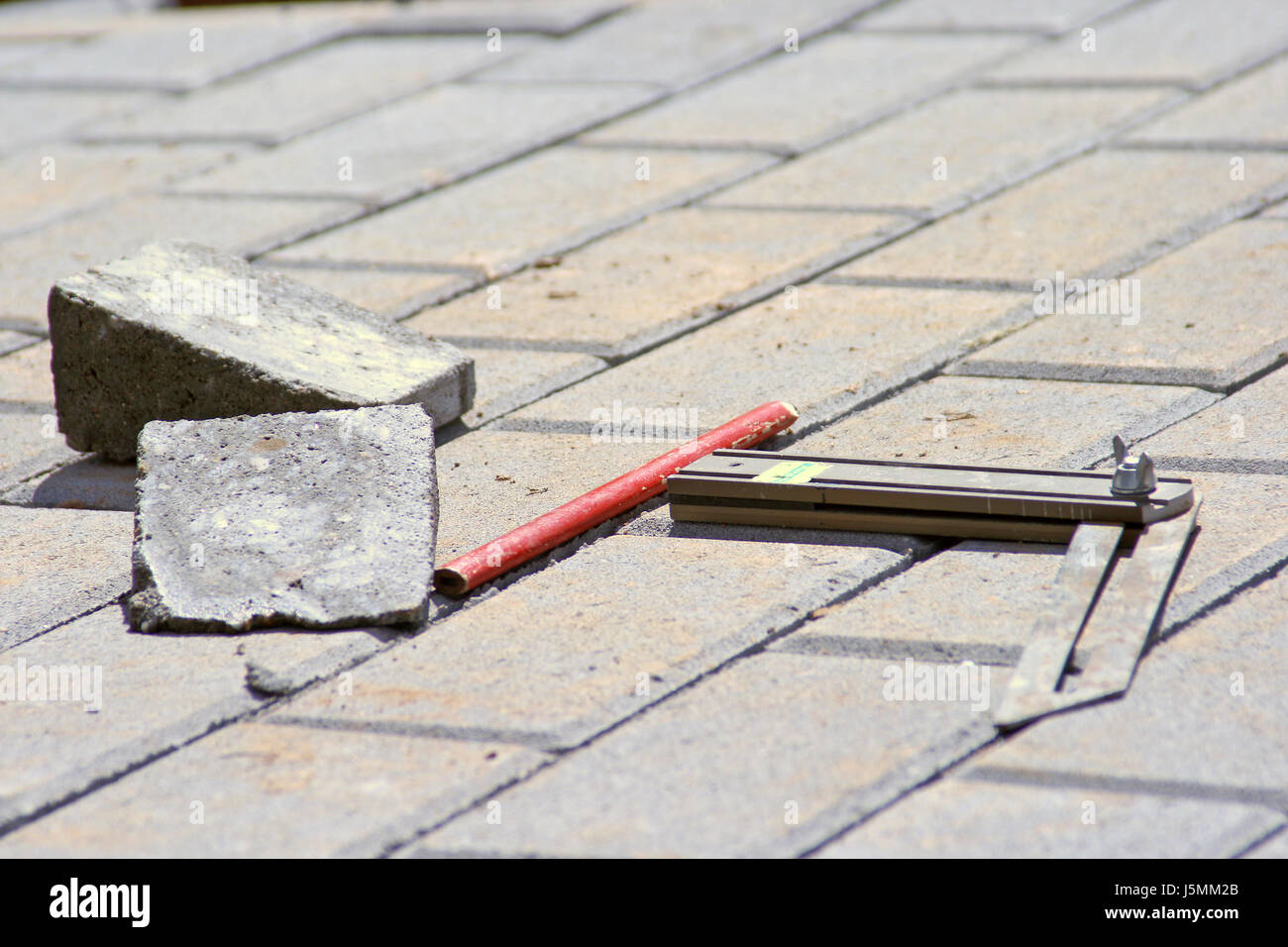 Laying cobblestones hi-res stock photography and images - Alamy