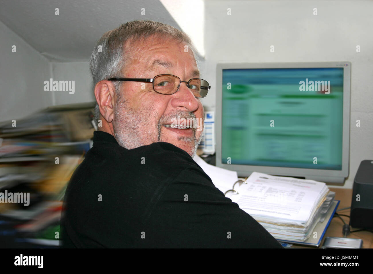 at the computer Stock Photo - Alamy