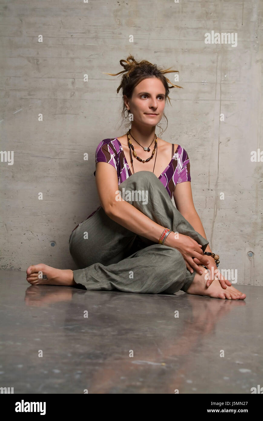 Seated woman hi-res stock photography and images - Alamy