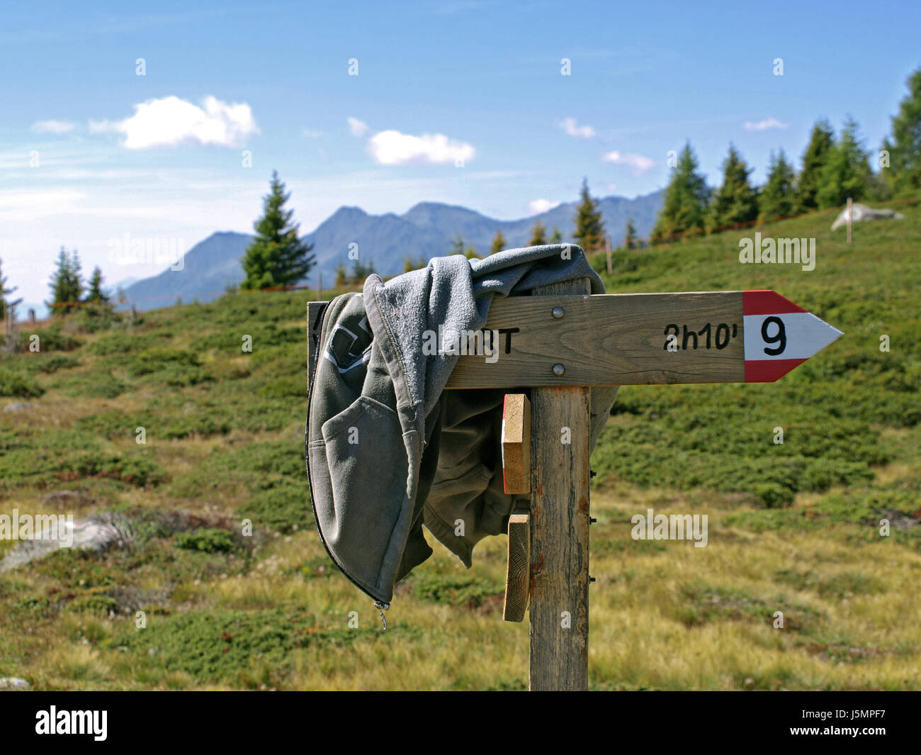 clothes rack - signpost Stock Photo - Alamy