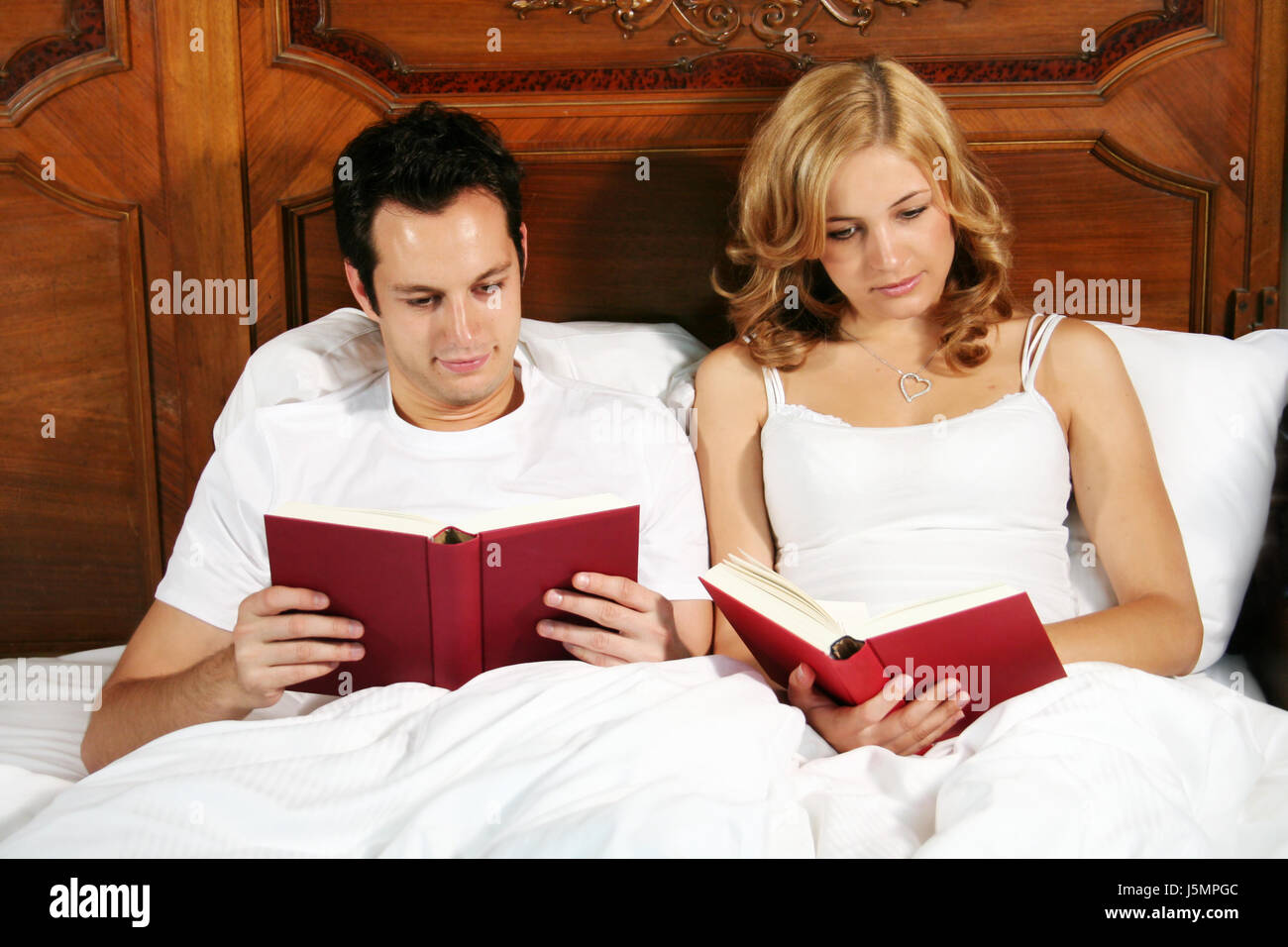 reading in bed Stock Photo - Alamy