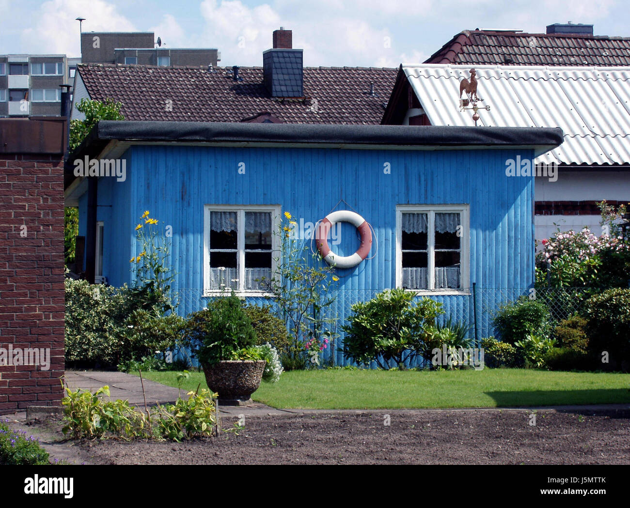 blue house building home dwelling house residential building garden ...