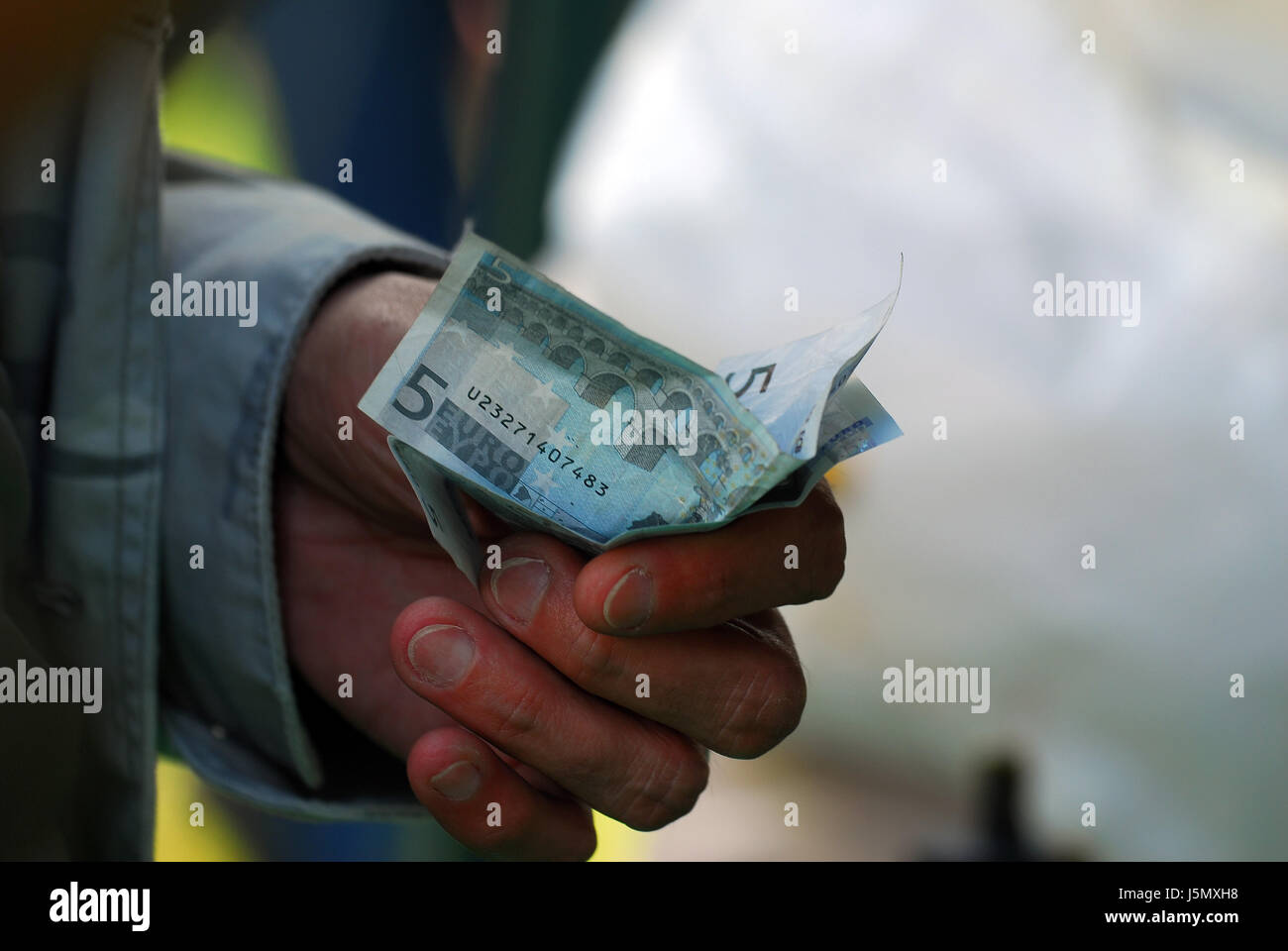 pay hand hands finger euro bank note count invoice payment computations ...