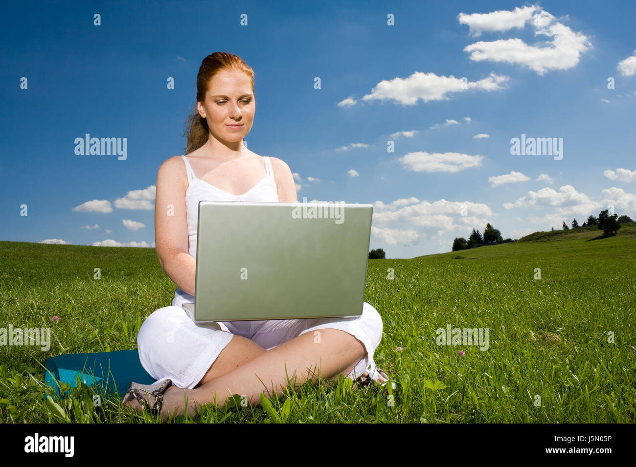 outside on laptop Stock Photo - Alamy