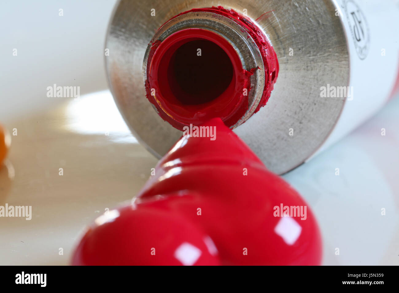 tube of paint red Stock Photo - Alamy