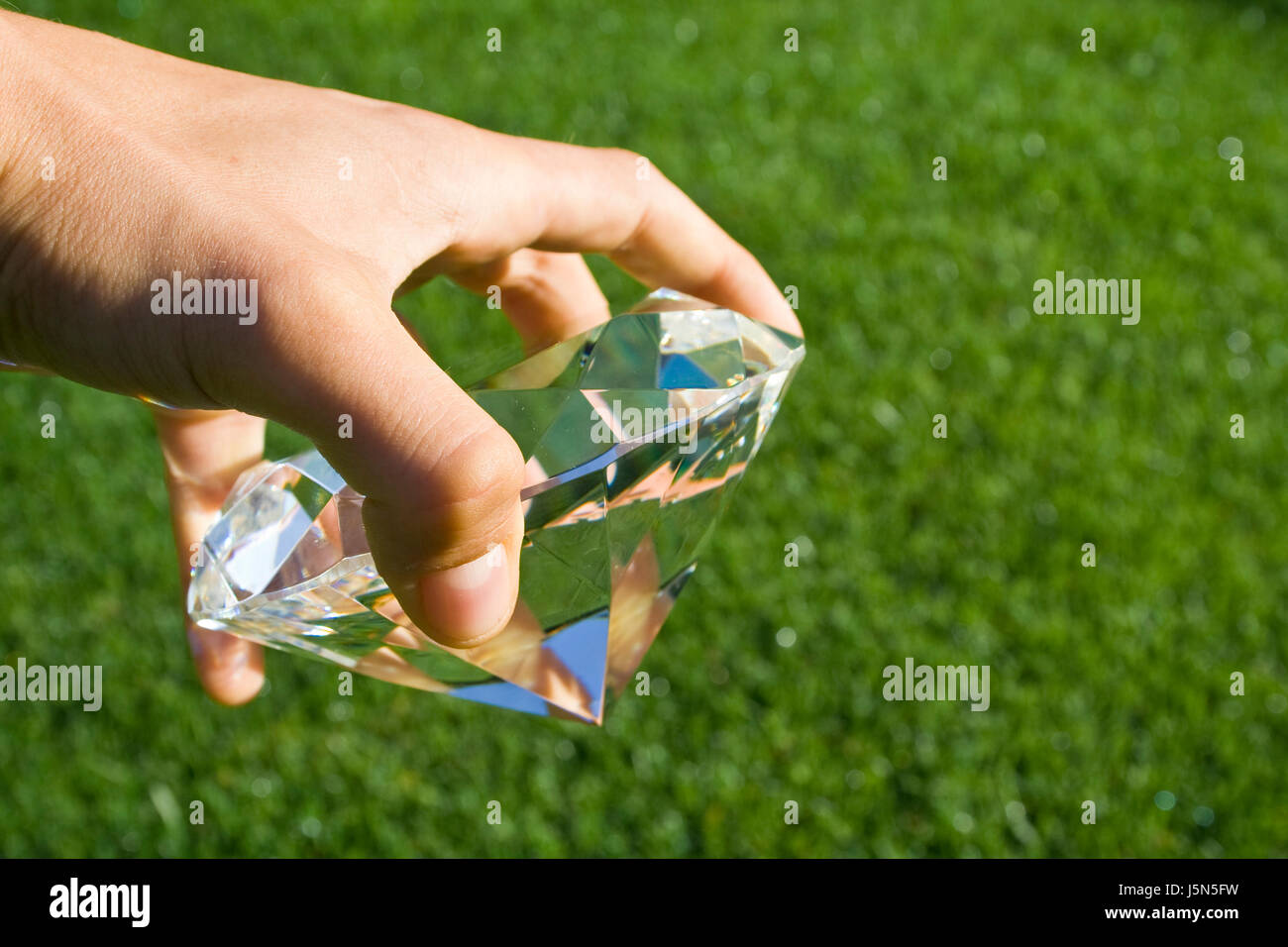 Hand glass diamonds hi-res stock photography and images - Alamy