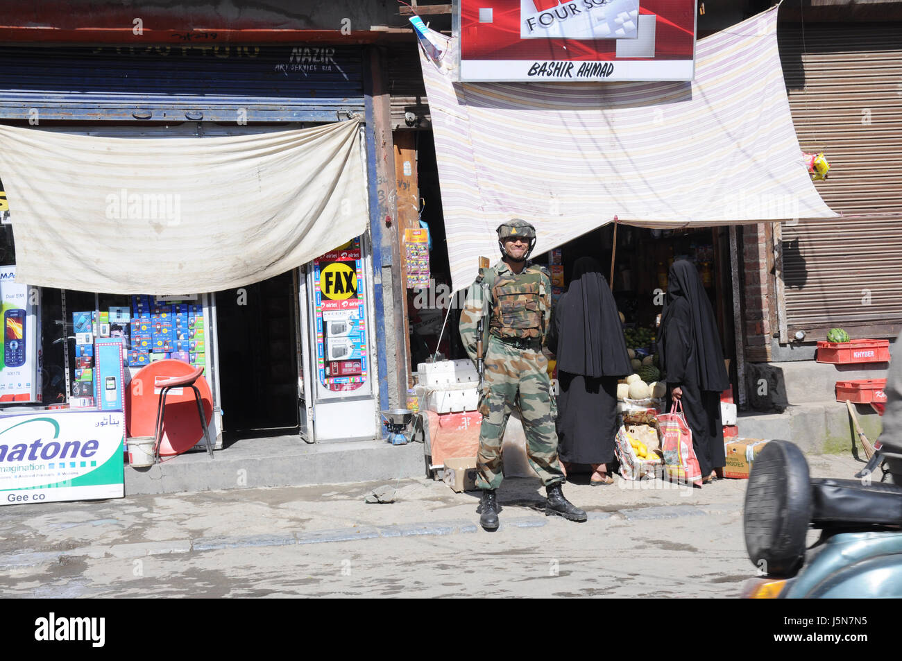 Indian Army control, Street in Srinagar, Srinagar is the largest city ...