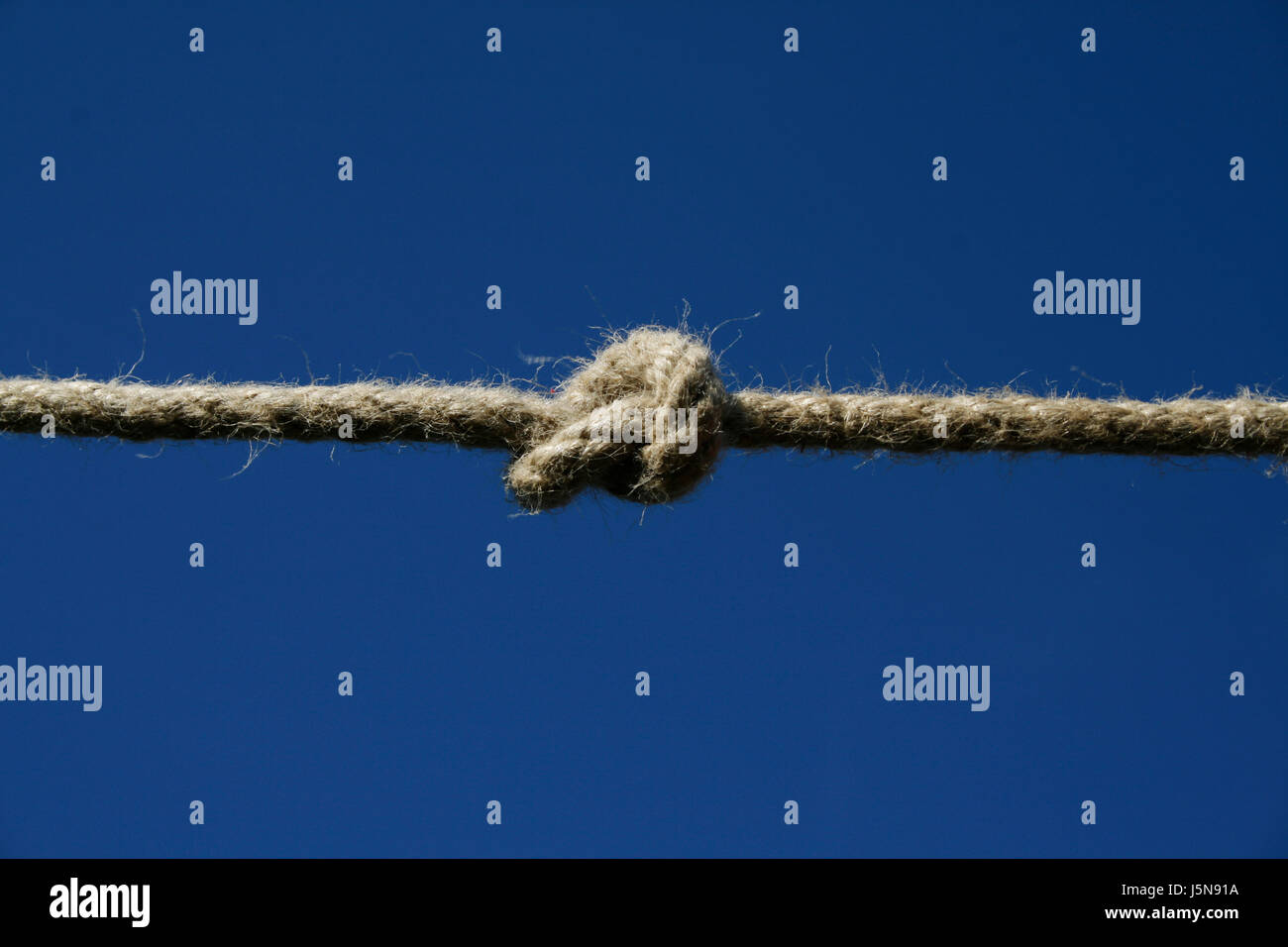 cord,voltage,span,fasten with knots,enmesh,rope,knot Stock Photo - Alamy