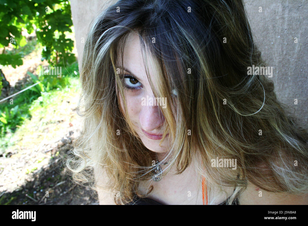 woman brown brownish brunette curious nosey nosy eyes hairs look ...