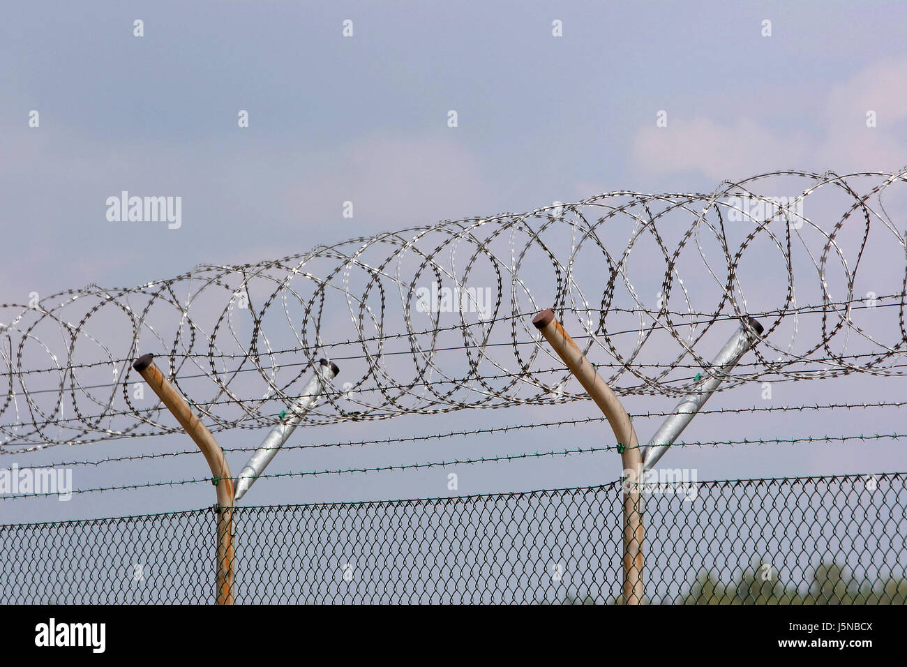 blue pointed fence barrier barbed wire wire netting ban lock unrolled ...