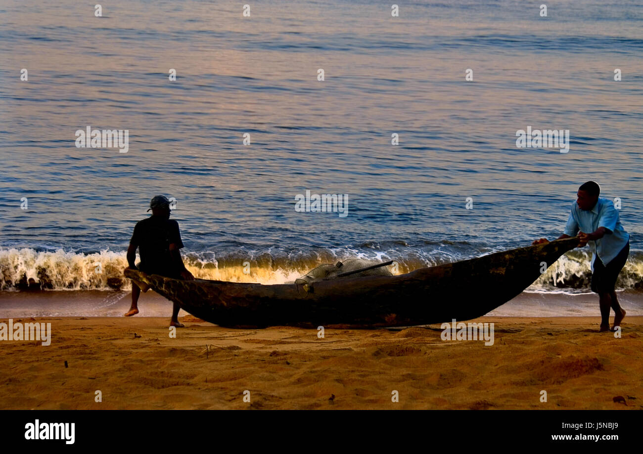 africa waves surf fisherman setting sun cameroon water rowing boat ...