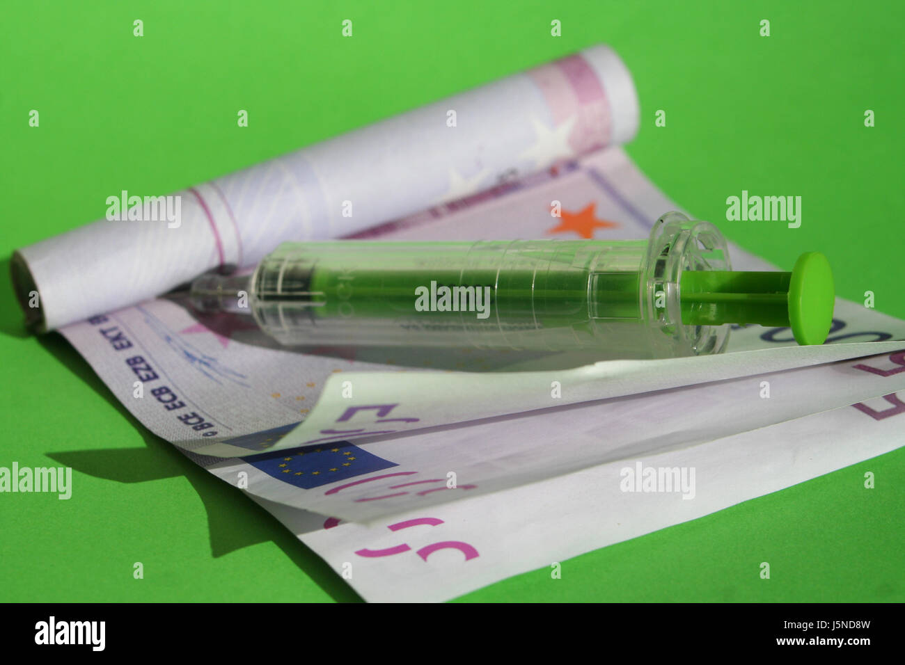 cash injection 1 Stock Photo - Alamy