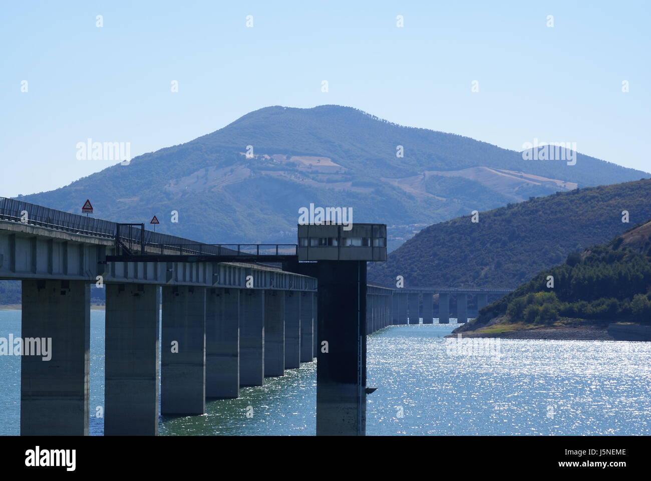 bridge over dam Stock Photo - Alamy