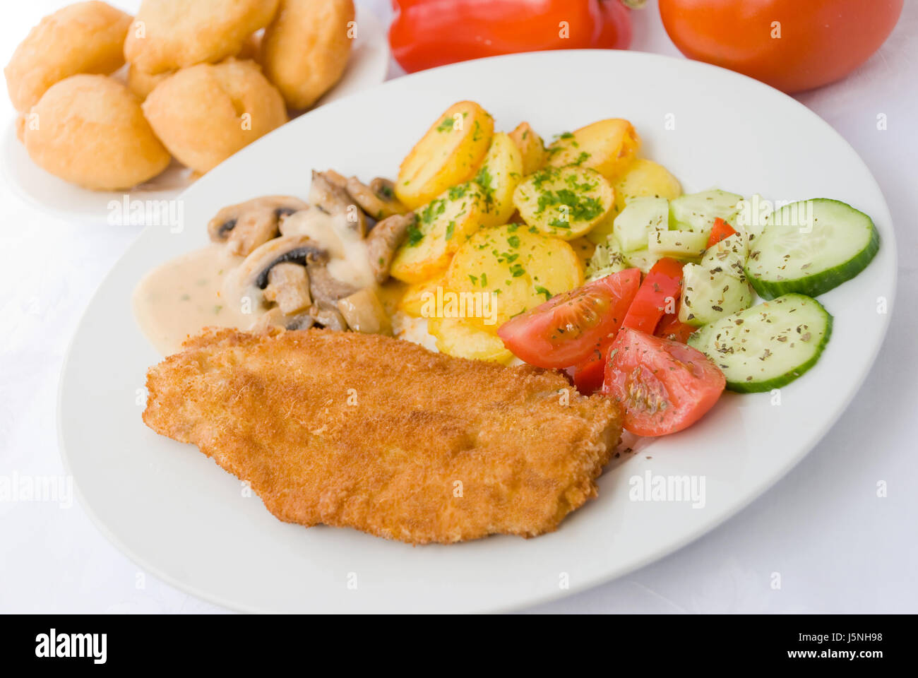 breaded cutlet with salad 9 Stock Photo - Alamy