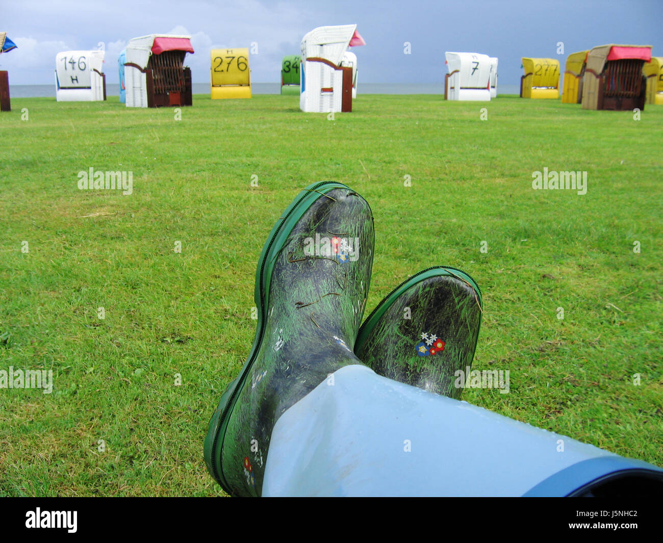 wellies front beach chairs Stock Photo - Alamy