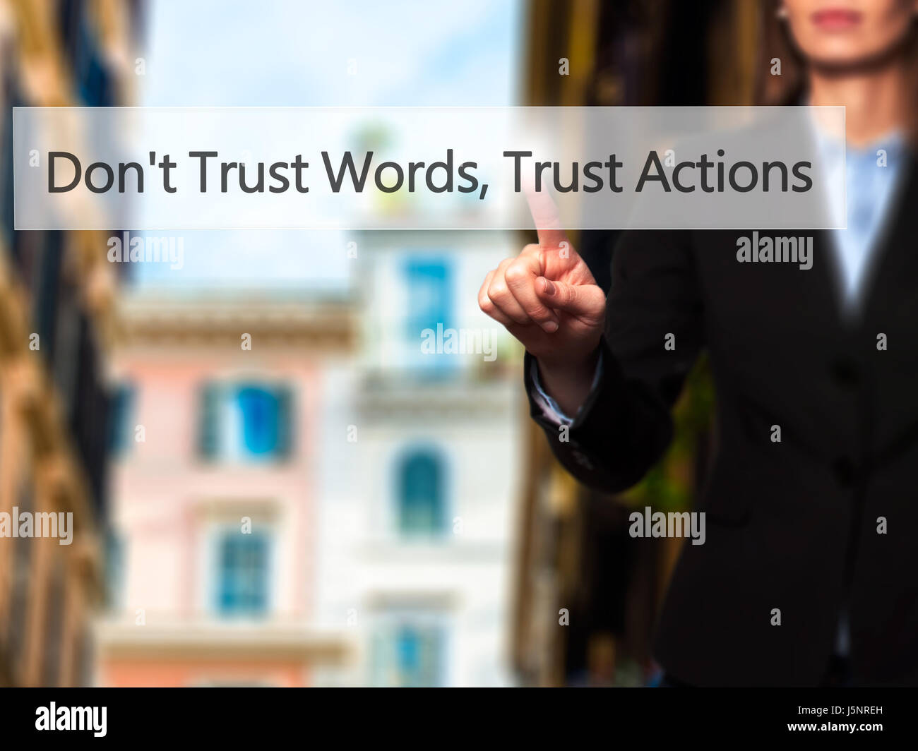 Don't Trust Words, Trust Actions - Businesswoman hand pressing button ...