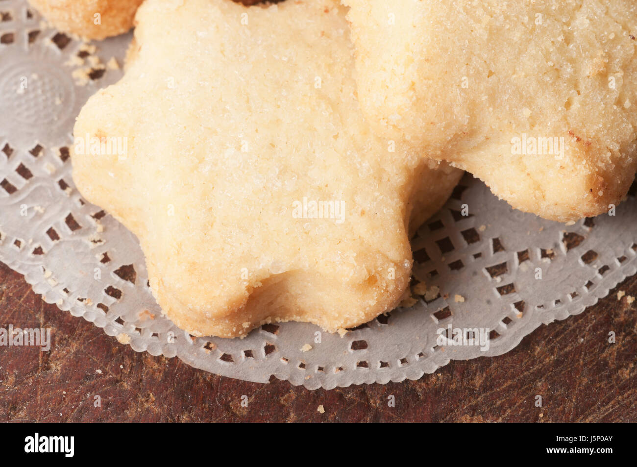 Sugar rose pastry on a timber board, close up Stock Photo - Alamy