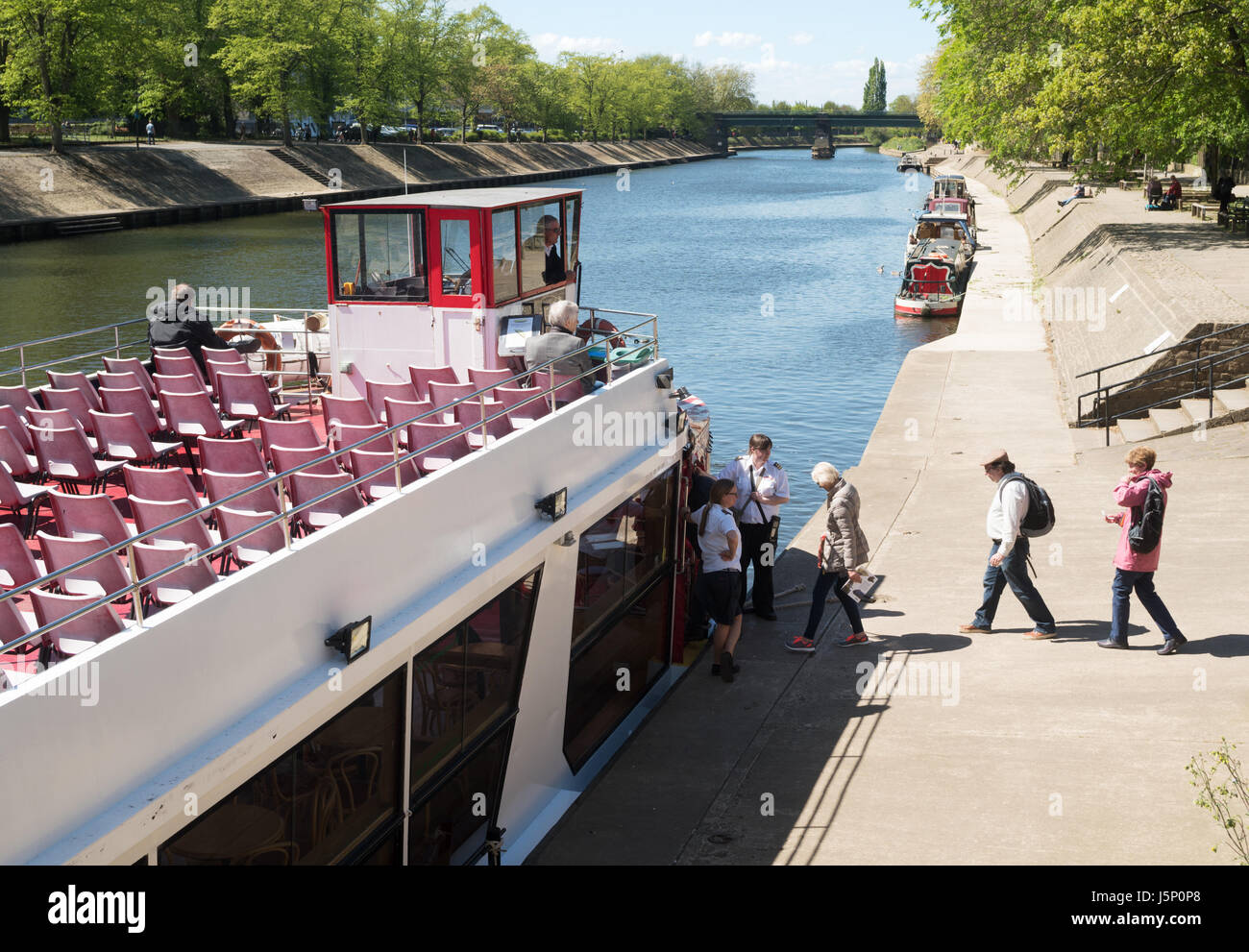 People boarding a YorkBoat for trip on the river Ouse, York, North ...