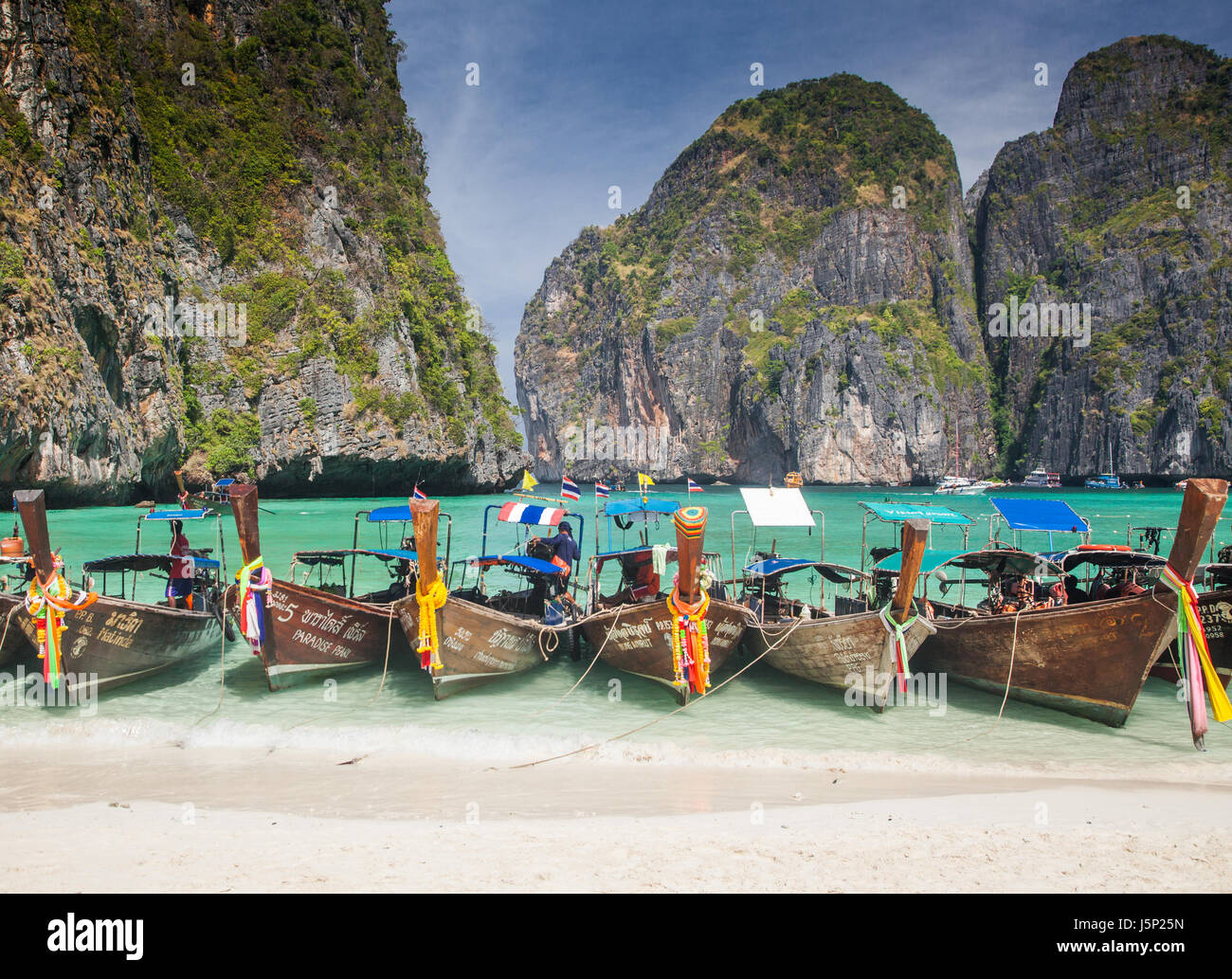 KO PHI PHI, THAILAND, February 1, 2014: Traditional long tail boats on ...