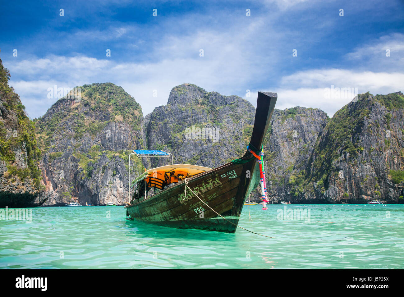 KO PHI PHI, THAILAND, February 1, 2014: Traditional long tail boats on ...