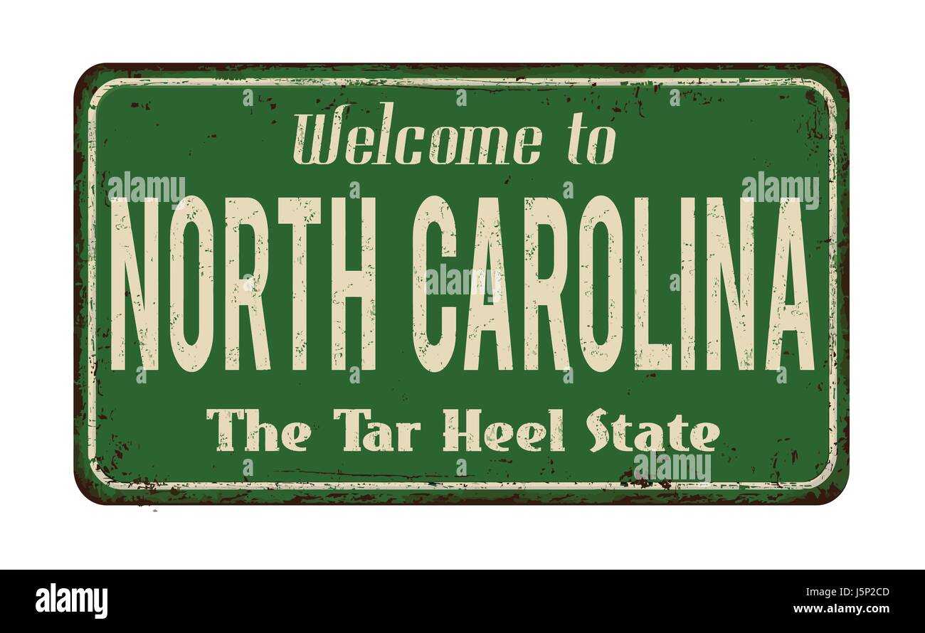 Welcome to North Carolina vintage rusty metal sign on a white ...