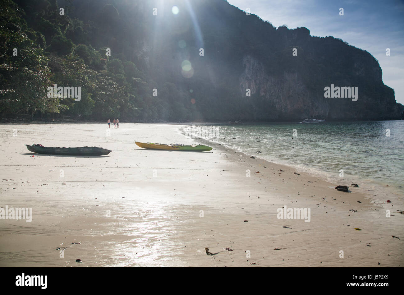 KO PHI PHI, THAILAND, February 1, 2014: Tropical beach with traditional ...