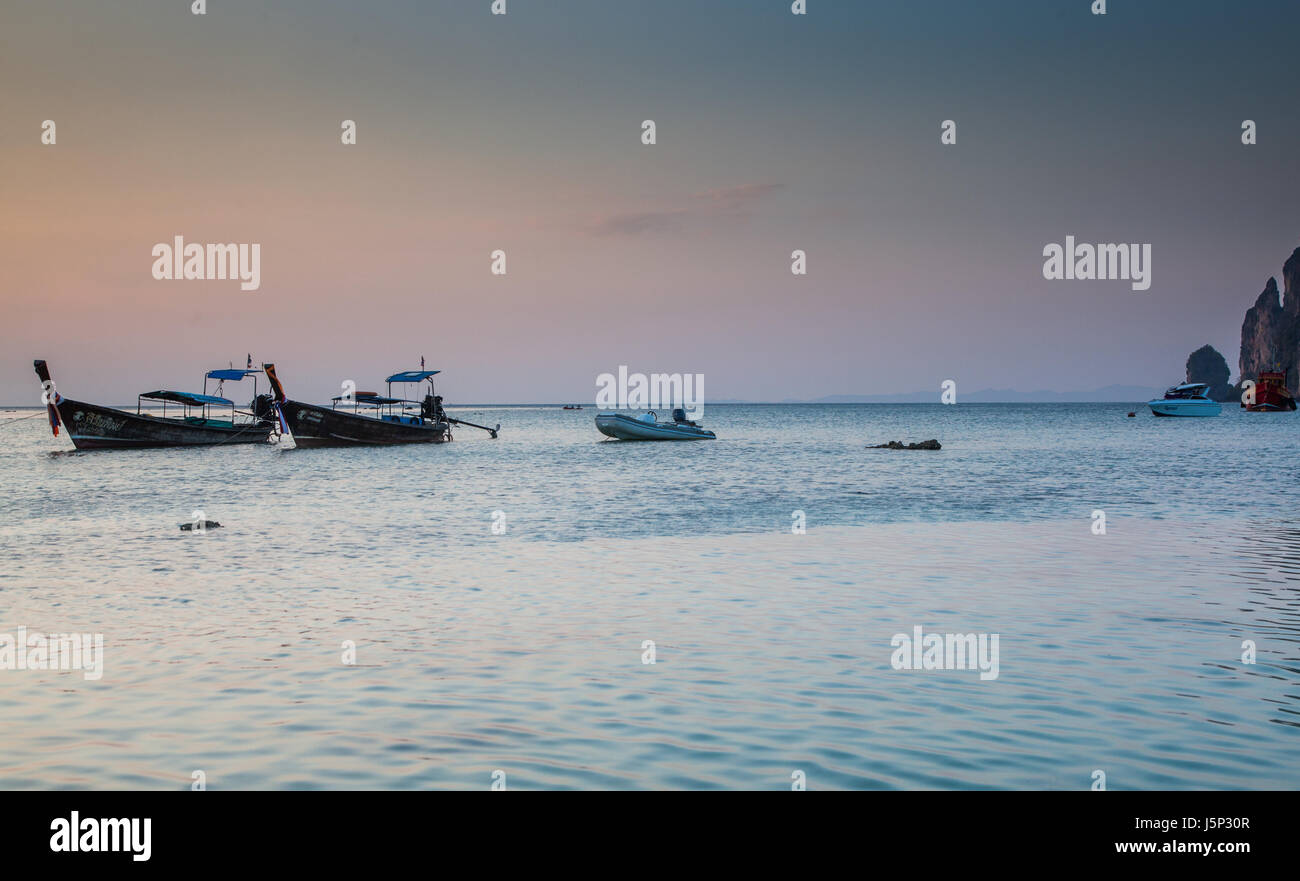 KO PHI PHI, THAILAND, January 31, 2014: Traditional long tail boats on ...