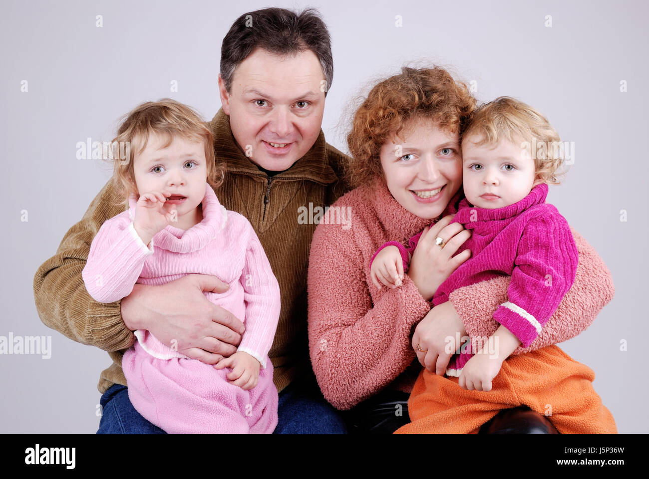 Family portrait mom dad twins hi-res stock photography and images - Alamy