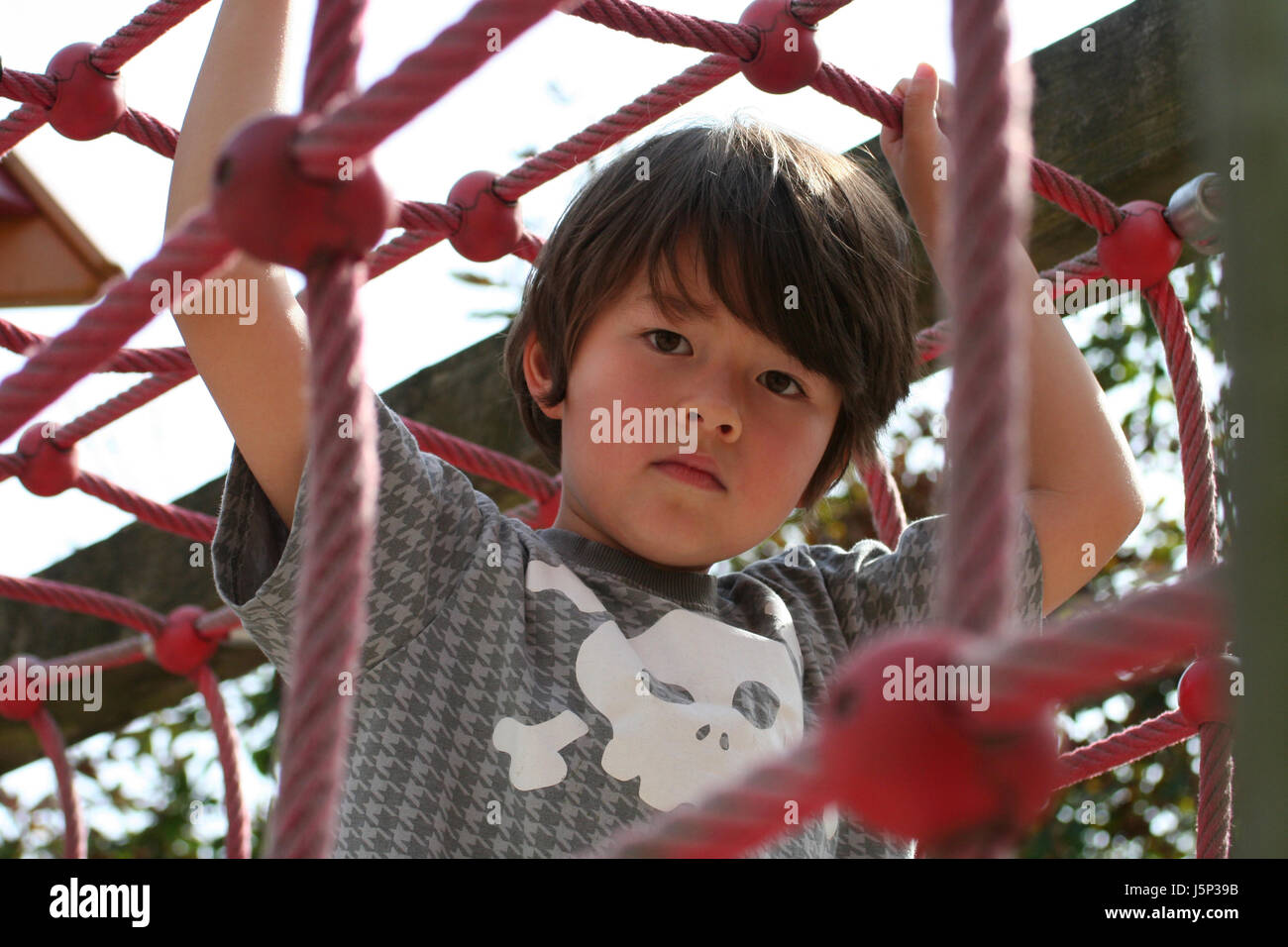 child climbing net Stock Photo - Alamy