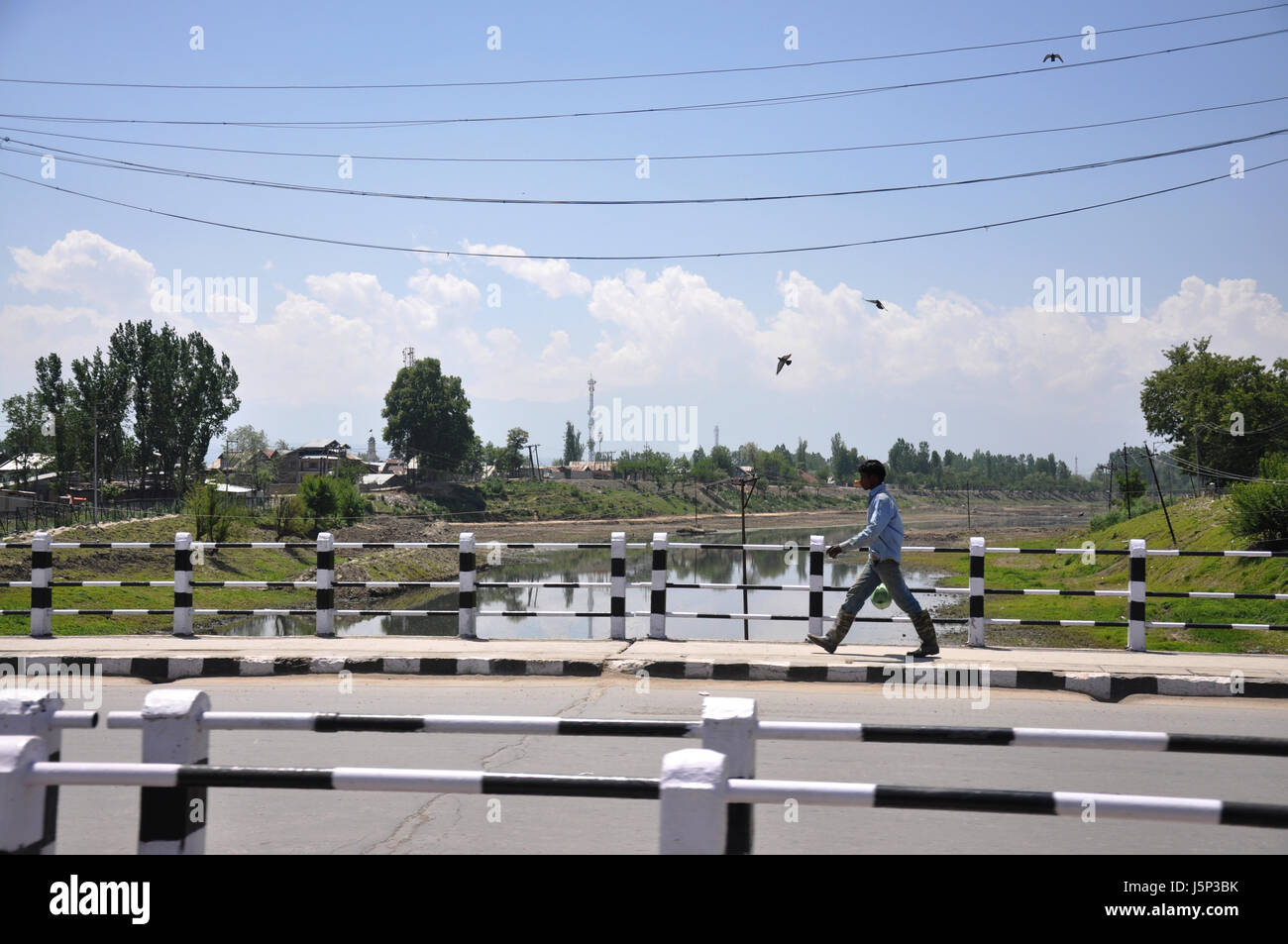 Kashmir over bridge, people waling, (Photo Copyright © by Saji Maramon ...
