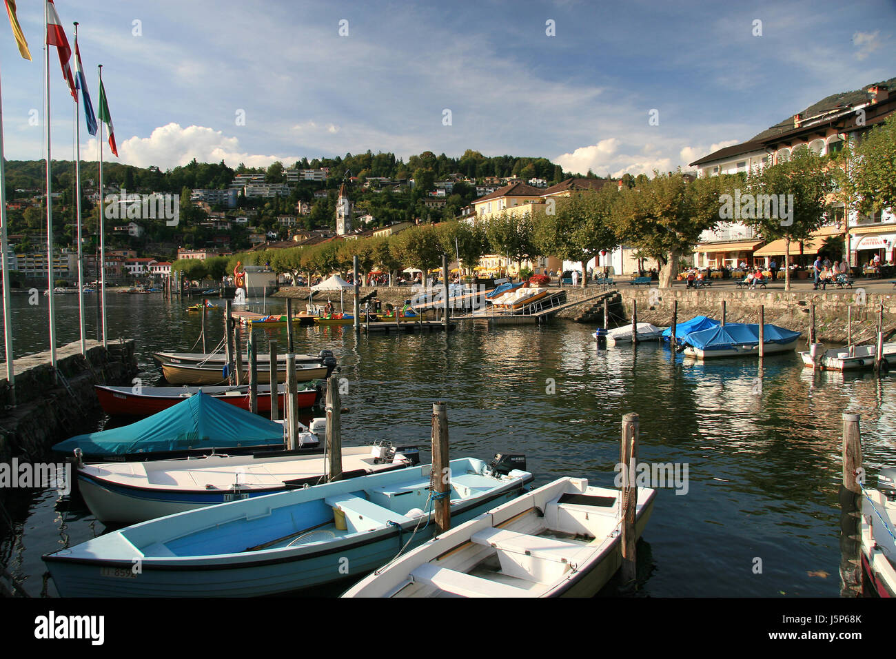 switzerland harbor harbours tessin houses tree trees mountains ...