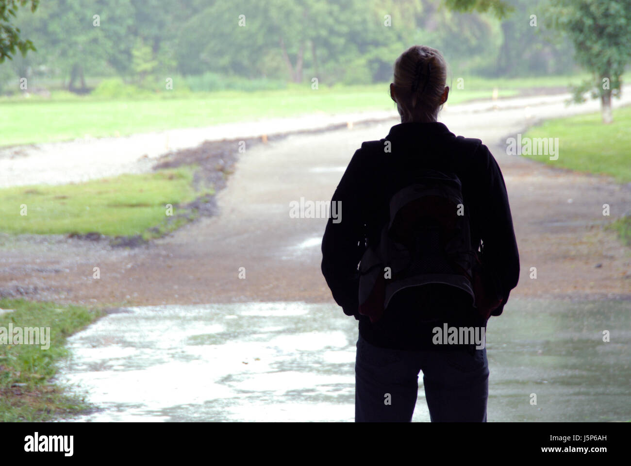 woman wait waiting park hike go hiking ramble person loneliness wet ...
