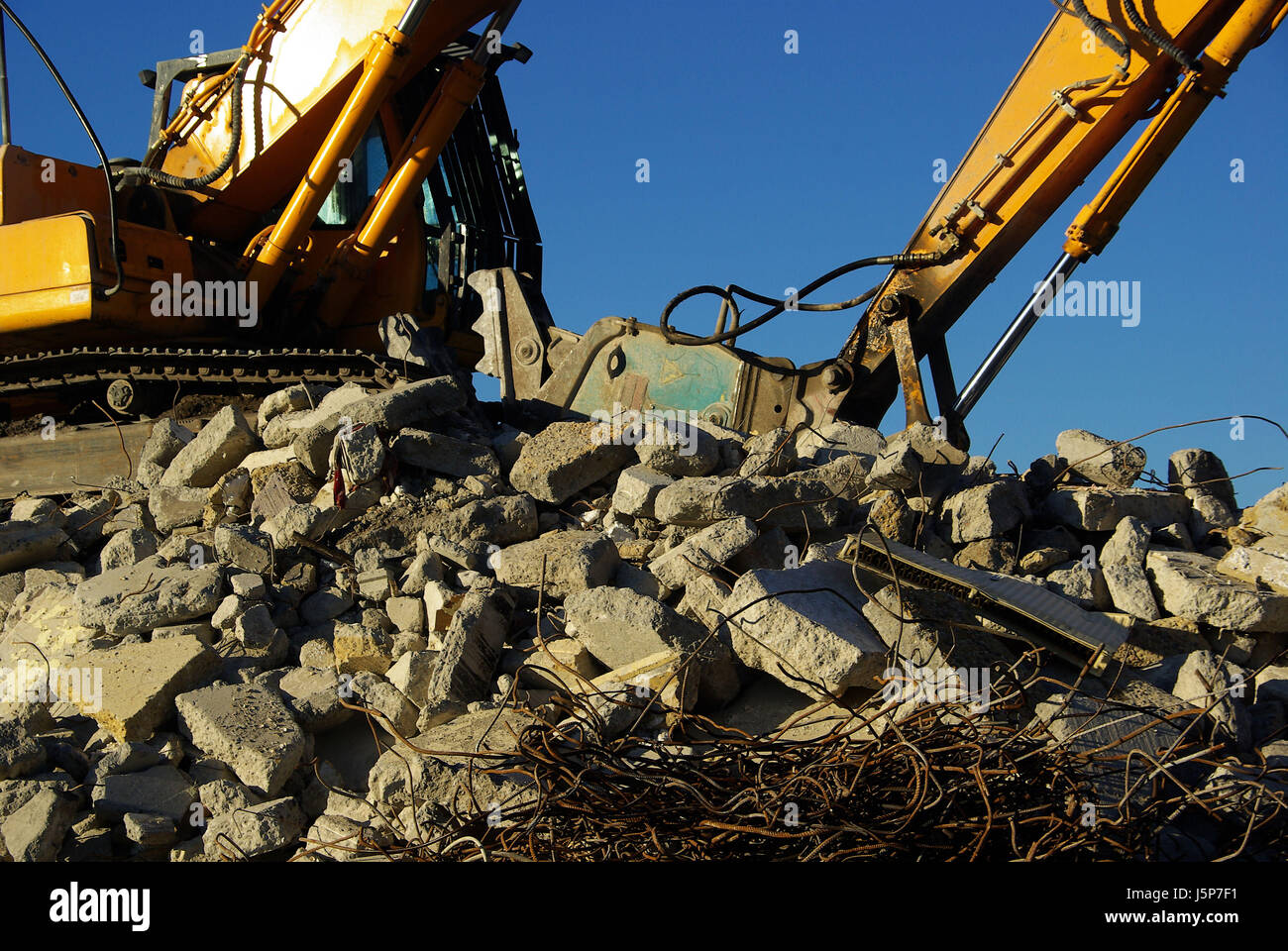 engine drive motor concrete dredger debris demolition scrapping hunks ...