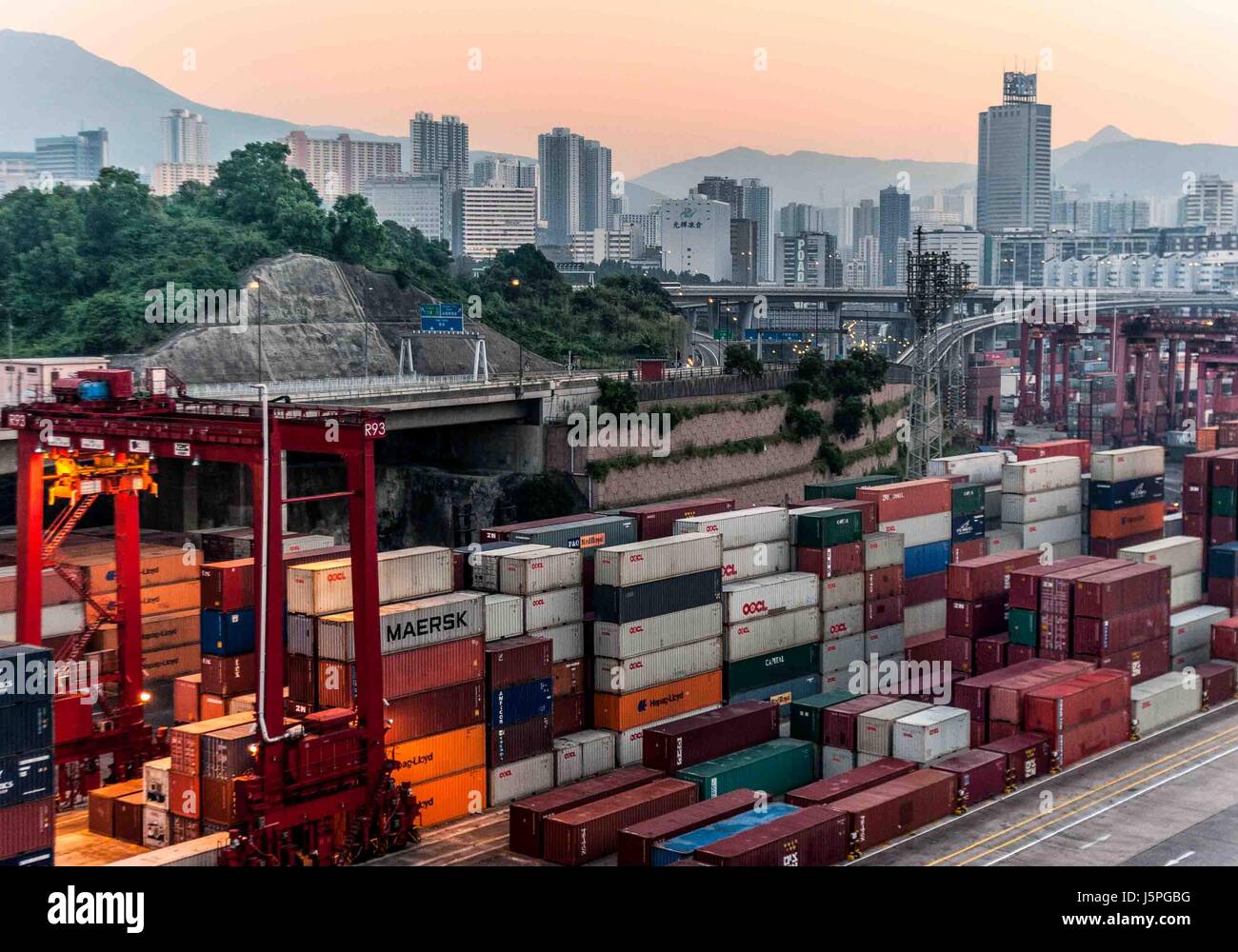 Hong Kong, China. 4th Nov, 2006. Shipping containers are stacked high ...