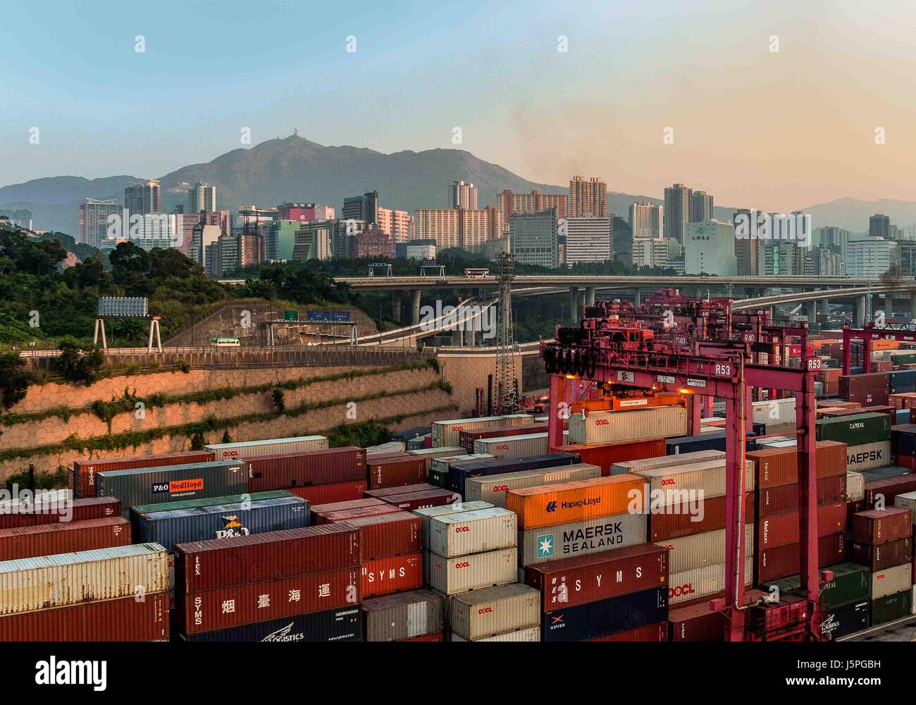 Hong Kong, China. 4th Nov, 2006. Shipping containers are stacked high ...