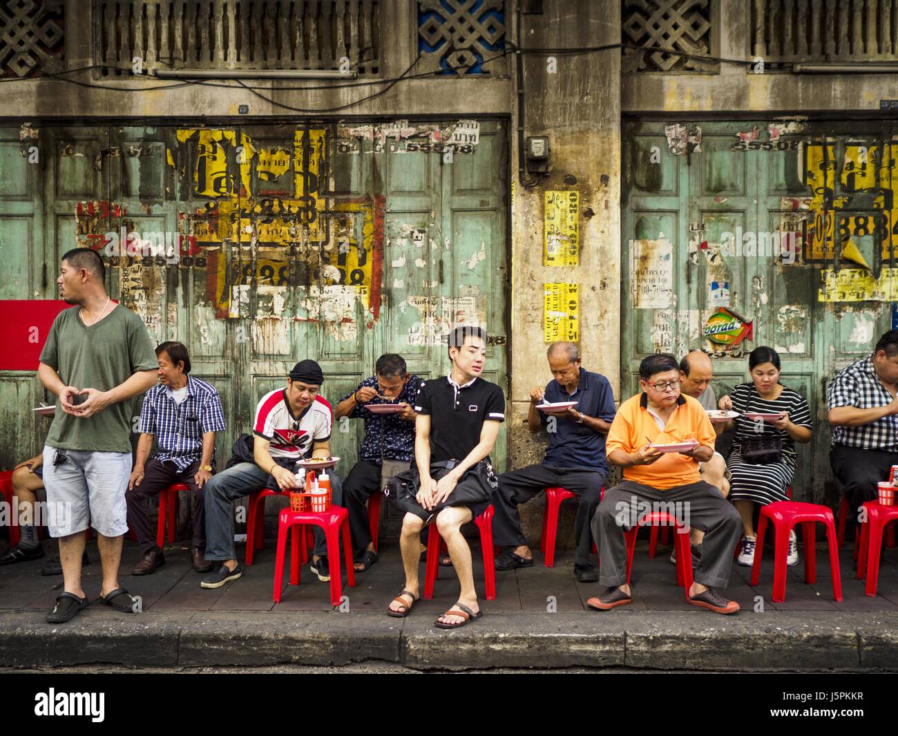 Bangkok, Bangkok, Thailand. 18th May, 2017. People sit on plastic ...