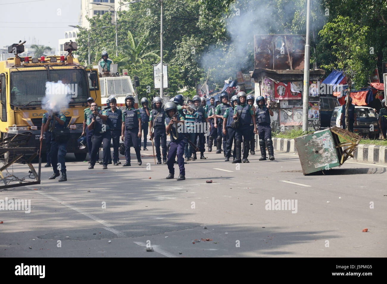 Dhaka, Bangladesh. 18th May, 2017. Bangladeshi police fire tear shell ...