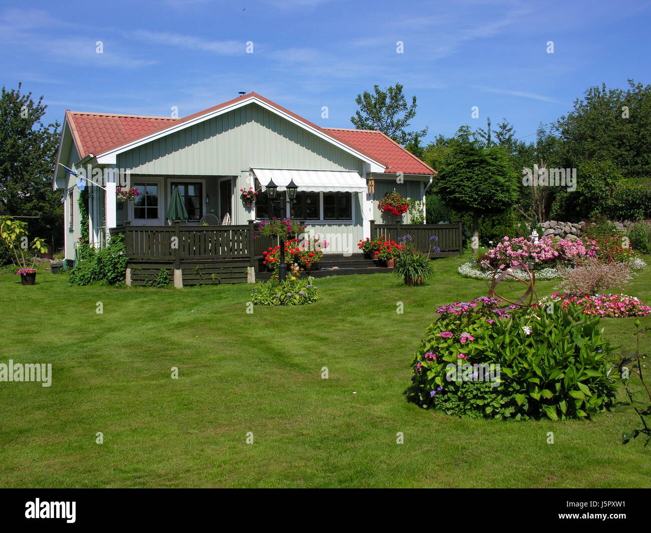house building garden flower flowers plant sweden framehouse sun dial ...