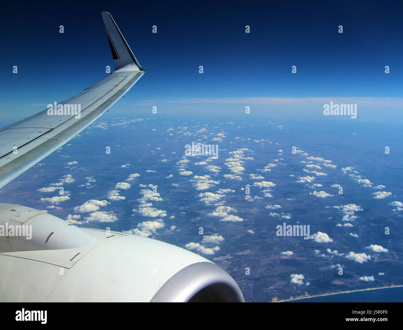 wing aircraft aeroplane plane airplane fly flies flys flying clouds ...