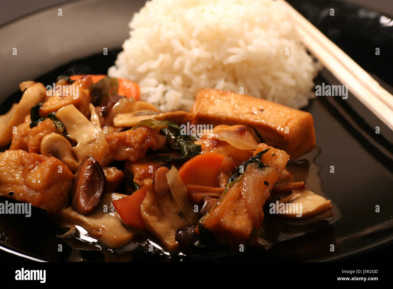 black swarthy jetblack deep black plate exotic mushrooms parsley stick ...