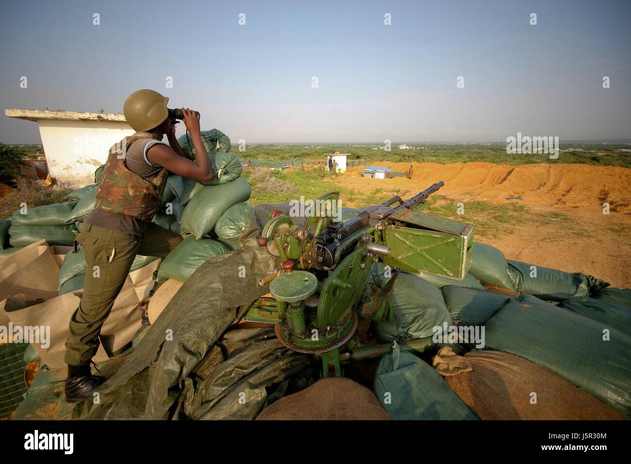African Union Mission in Somalia (AMISOM) Burundian soldiers man the ...