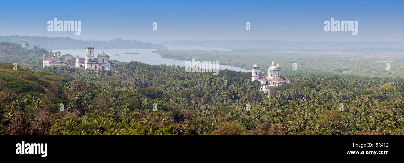 Aerial panoramic view Old Goa. Mandovi river and ancient Churches Stock ...