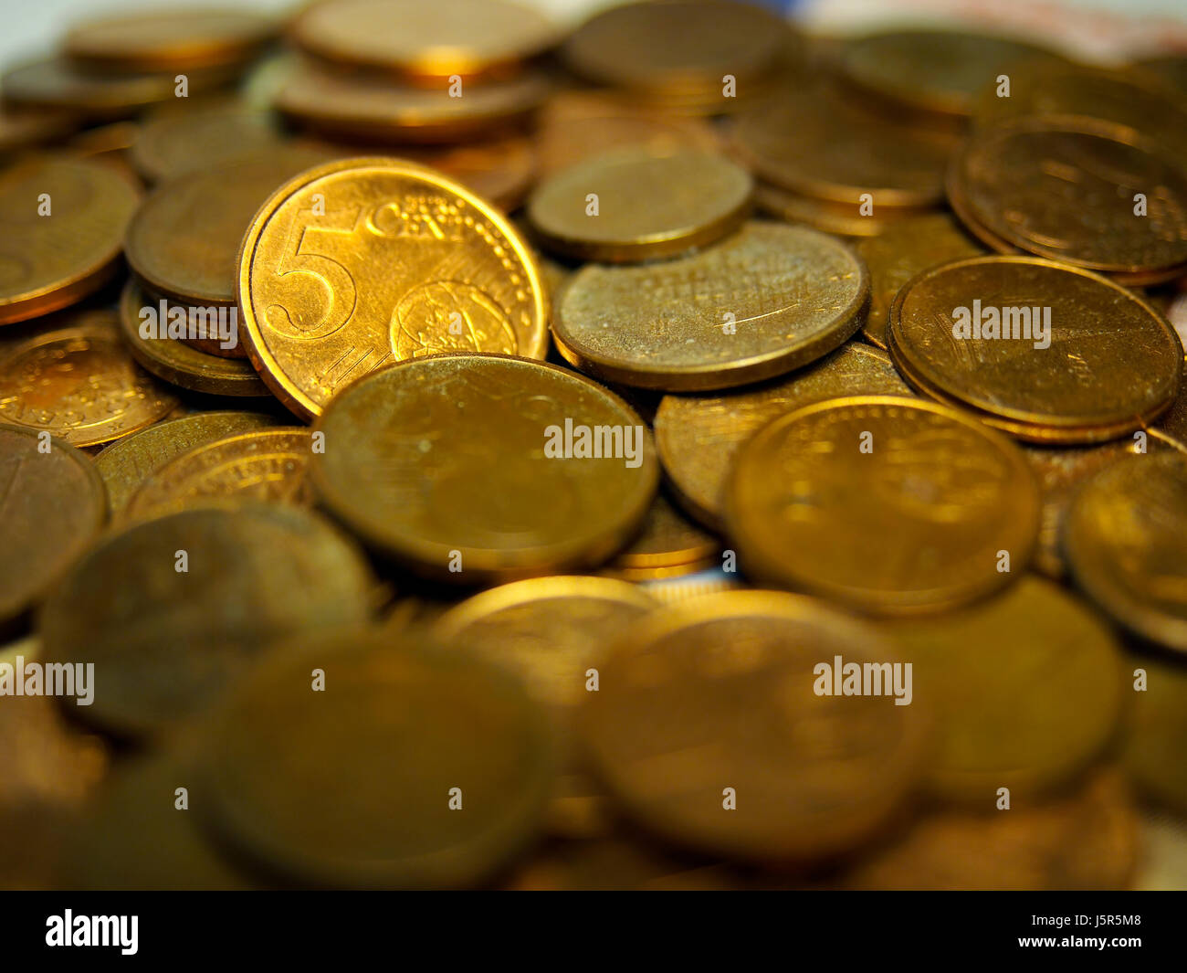 Coins. Pile of 5 cents euro Stock Photo - Alamy