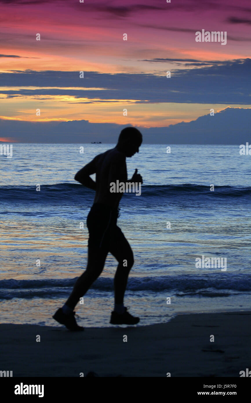 Jogging phuket beach hi-res stock photography and images - Alamy