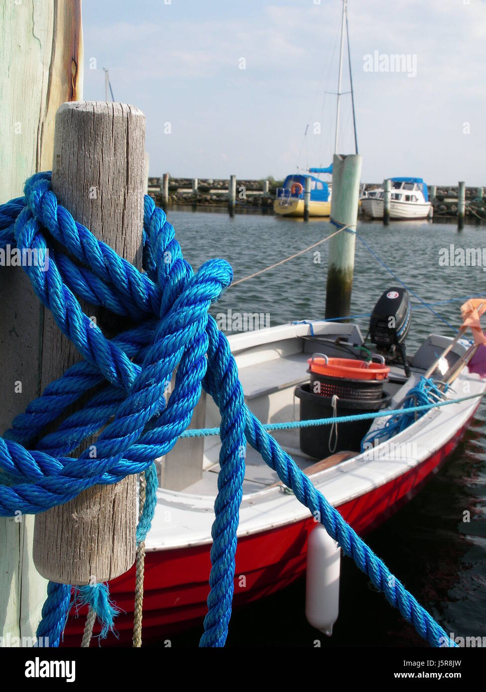 blue harbor harbours cord salt water sea ocean water red rope rowing ...
